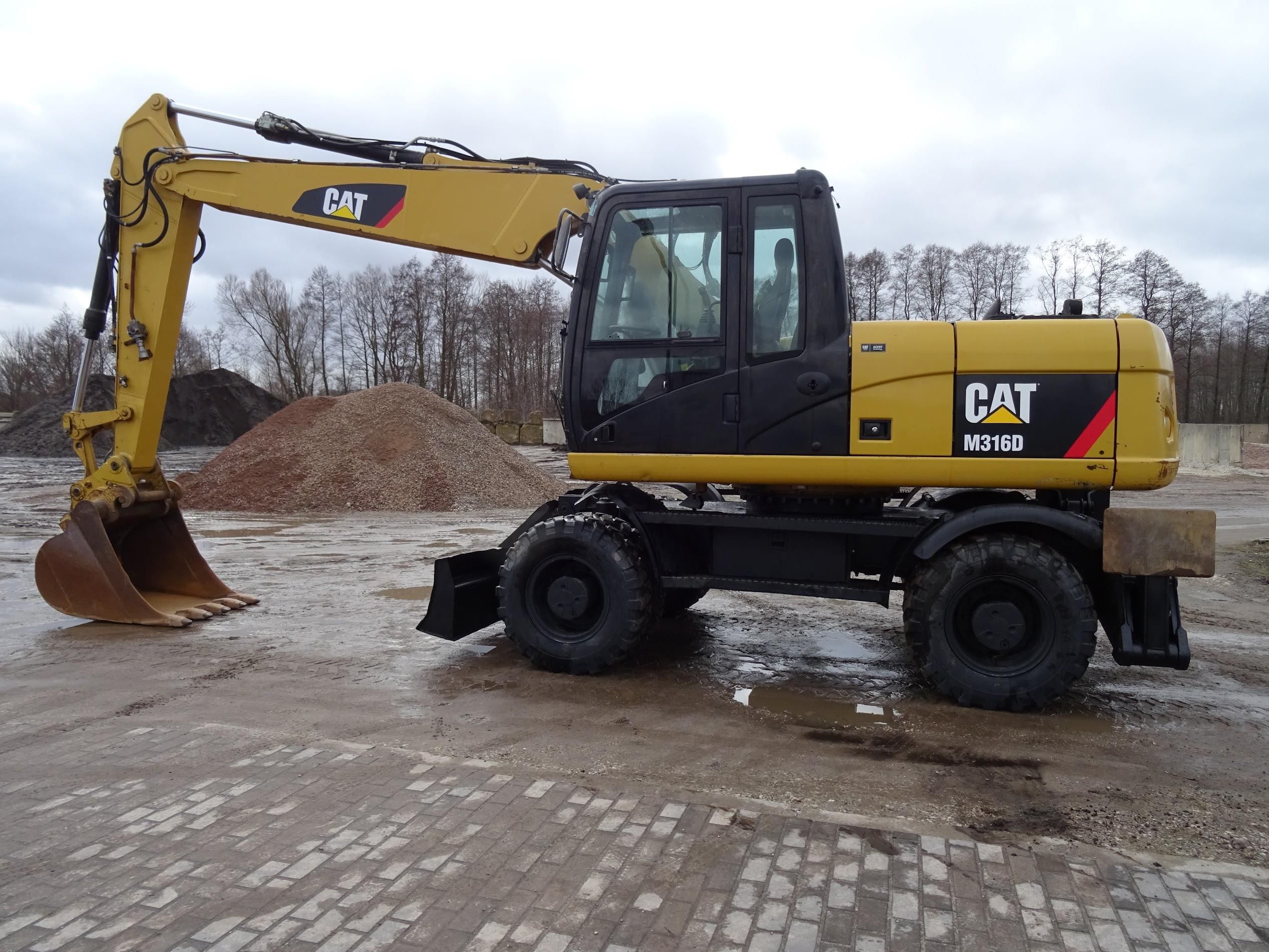 Koparka kołowa Caterpillar M316D CAT - Opinie i ceny na Ceneo.pl