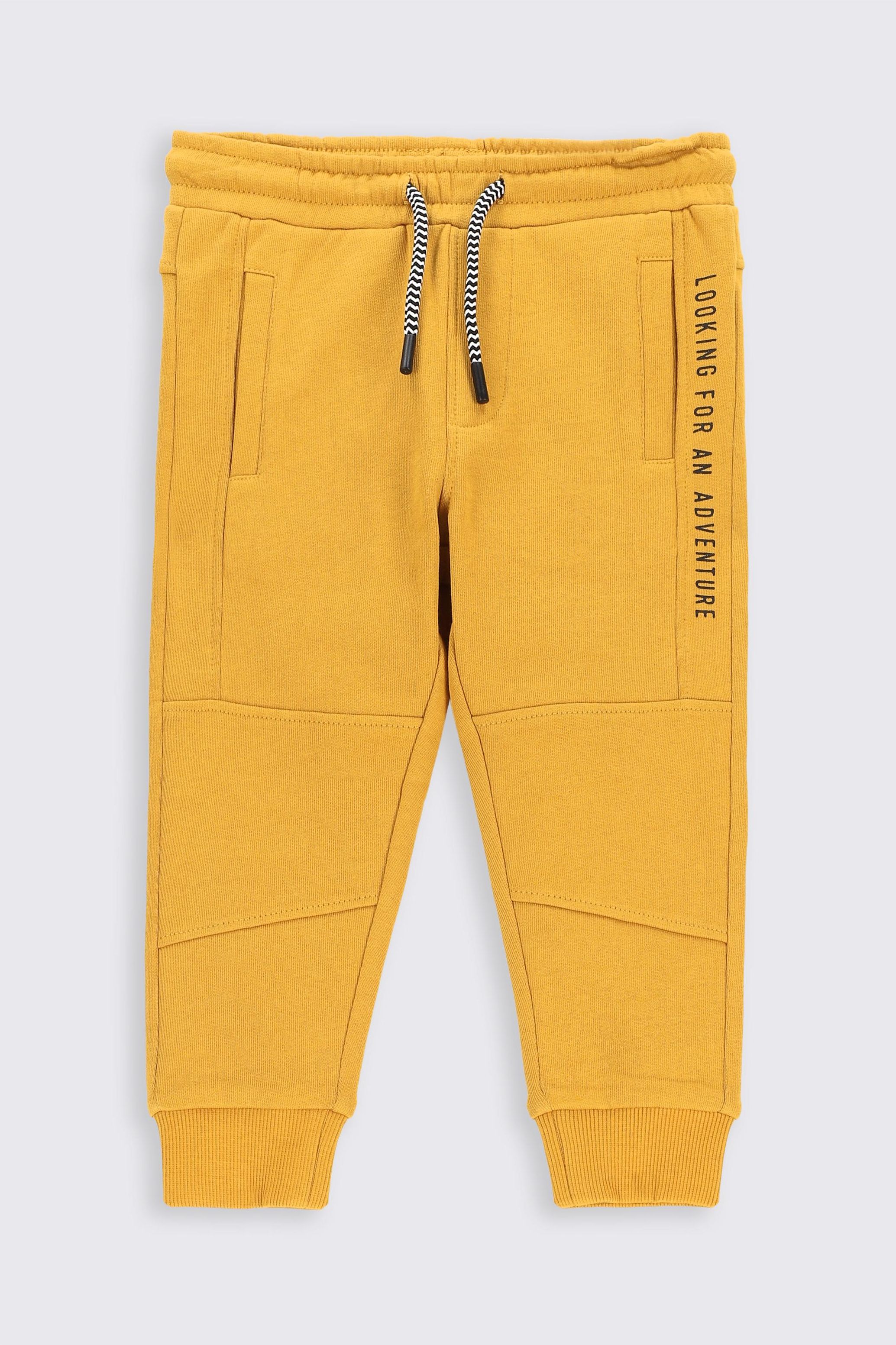 Spodnie dresowe miodowe z przeszyciami na nogawkach - Ceny i opinie ...