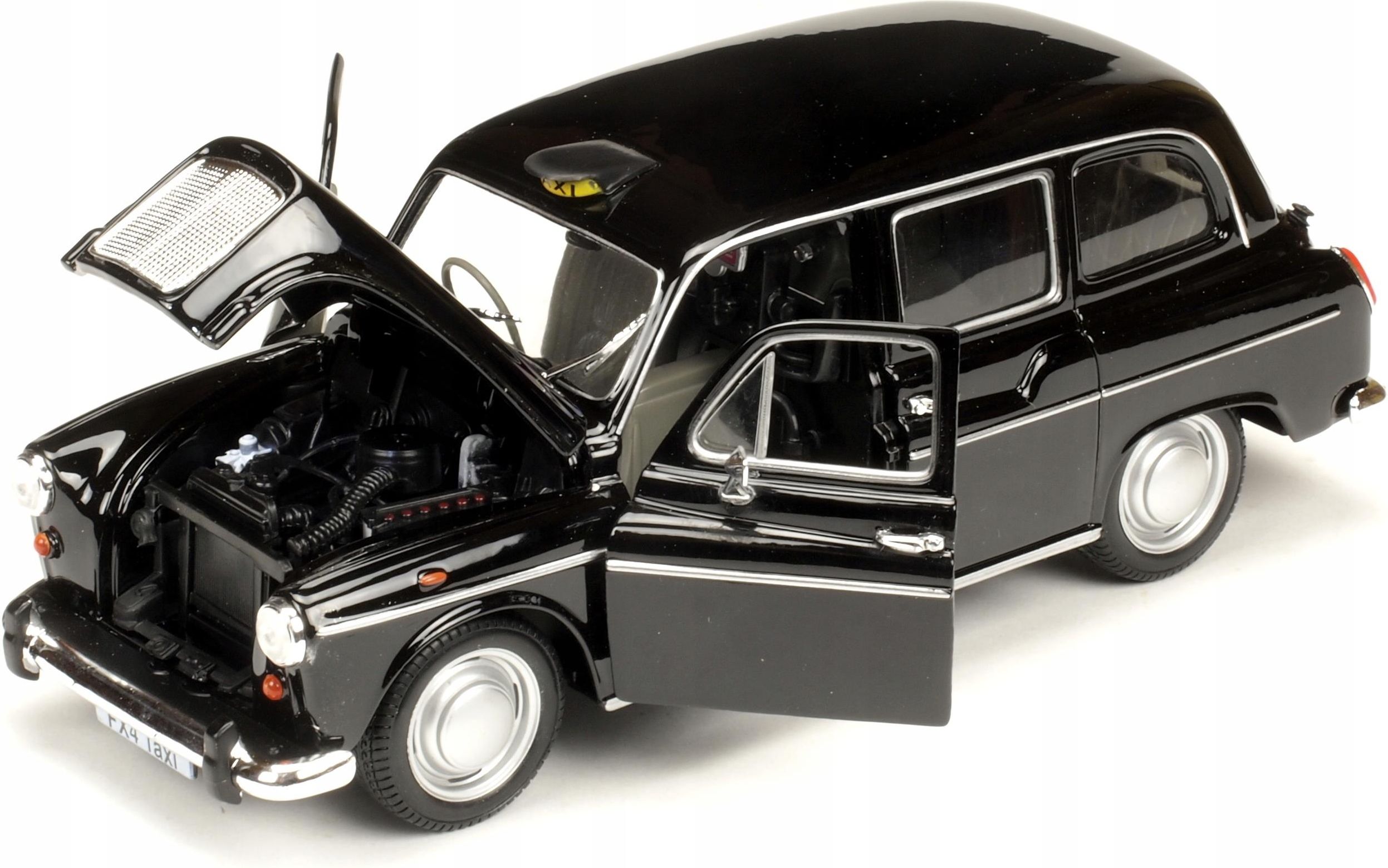 Metalowe Auto Austin FX4 London Taxi Welly 1:24 - Ceny i opinie - Ceneo.pl