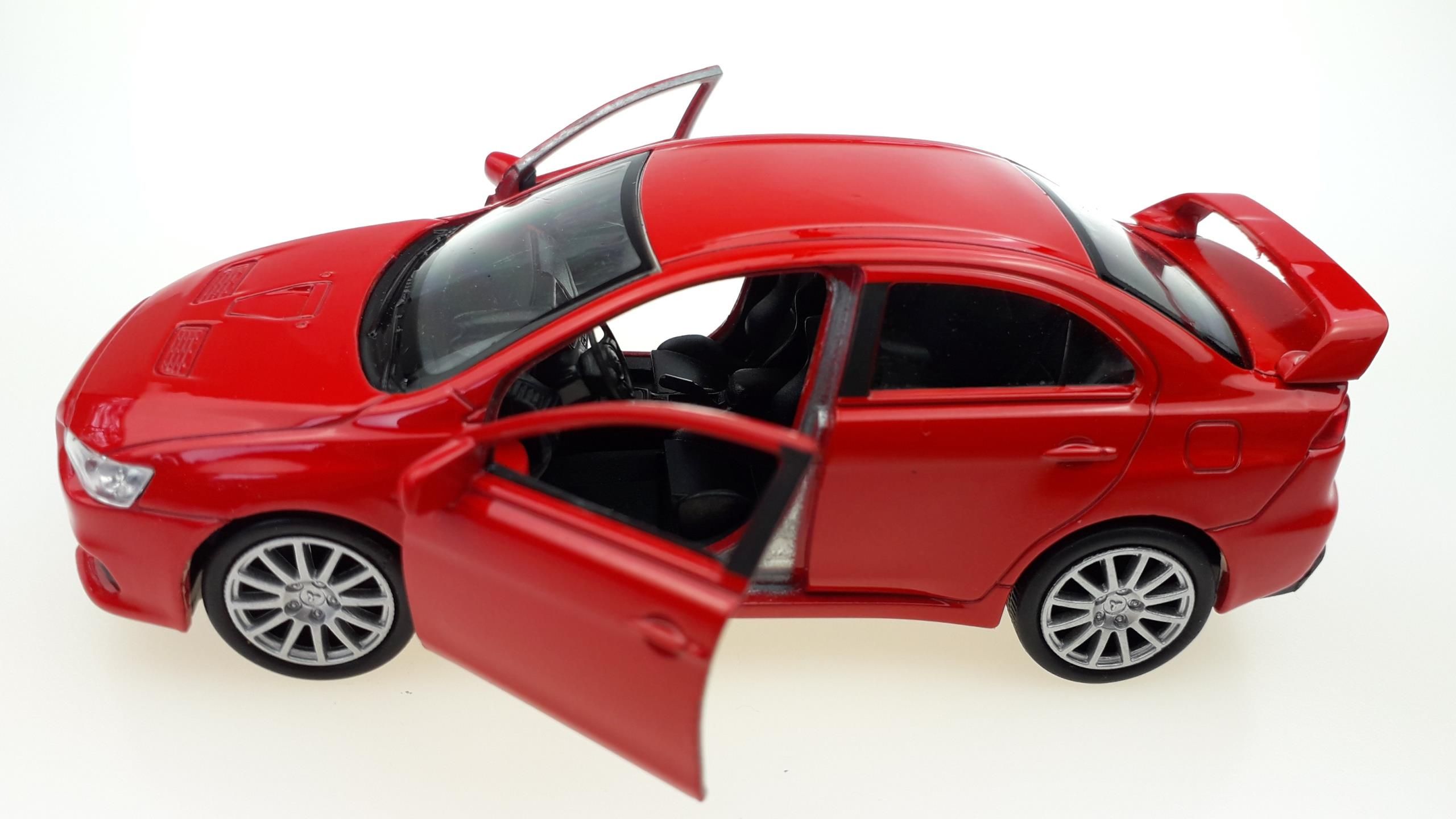 Mitsubishi Lancer Evolution X Czerwone Welly 1:34 - Ceny i opinie ...
