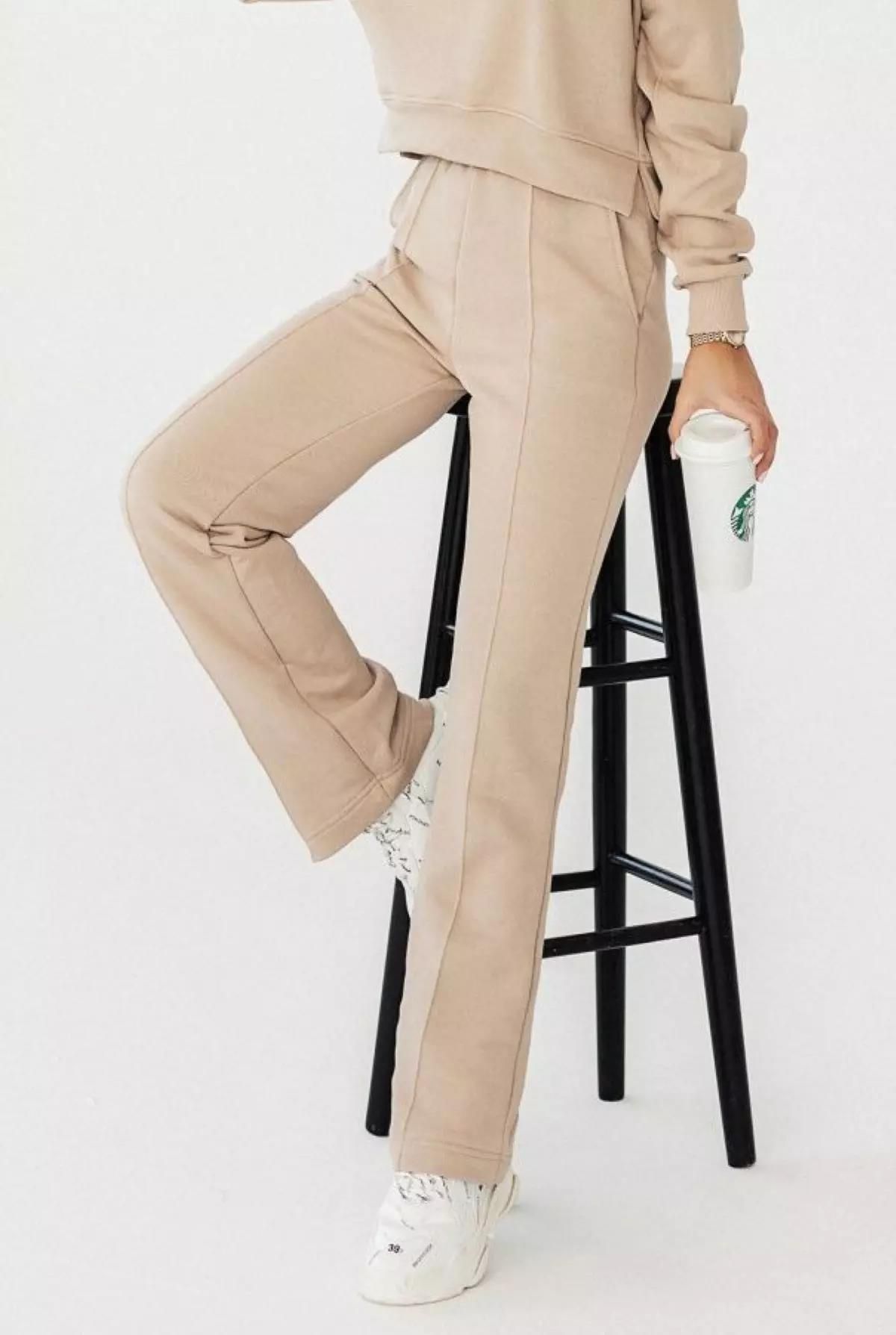 Dresowe spodnie z szerokimi nogawkami z przeszyciami (Beżowy, M/L ...