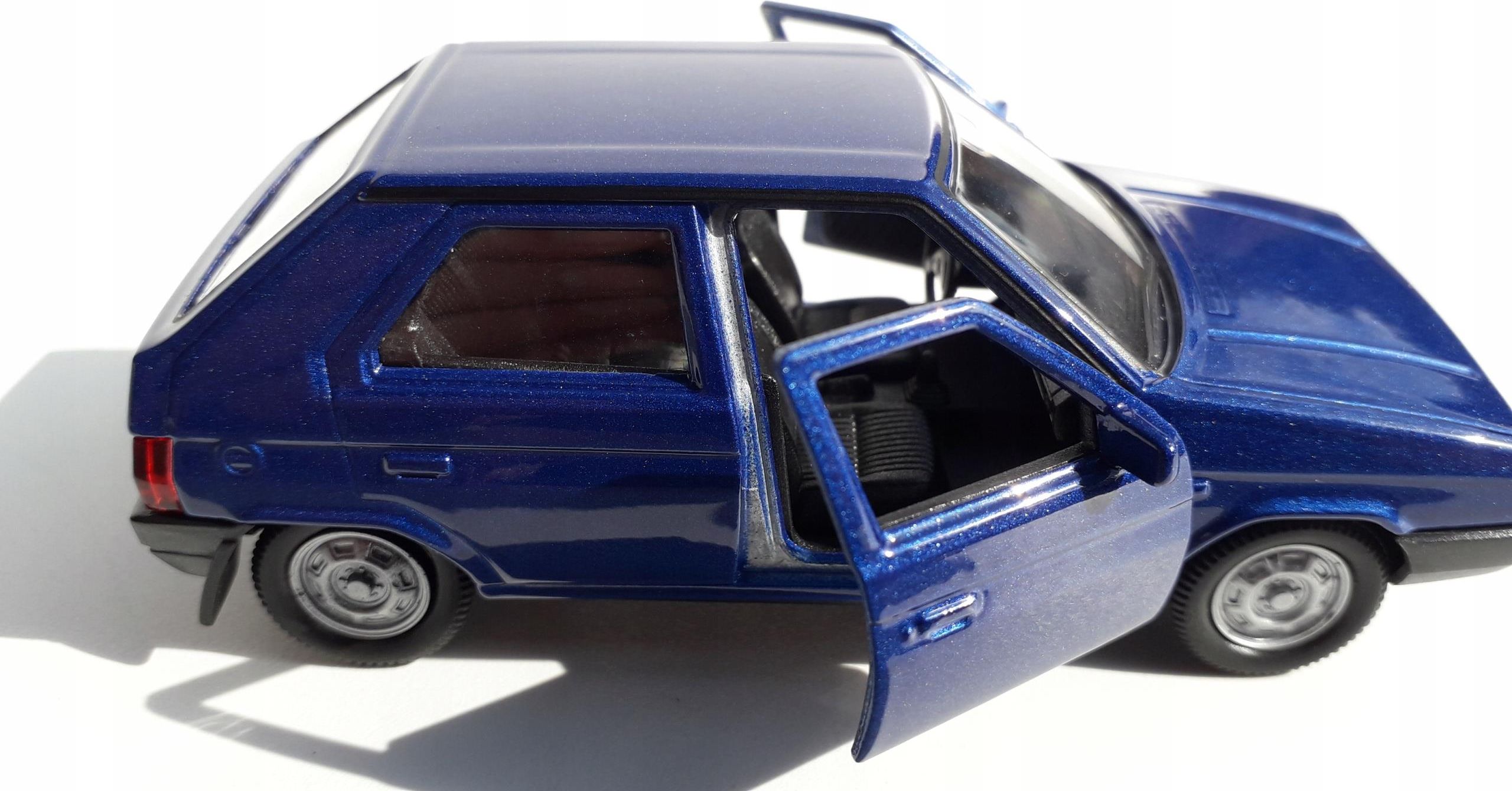 Welly Skoda Favorit Niebieska Metalowy Model 1:34 - Ceny i opinie ...