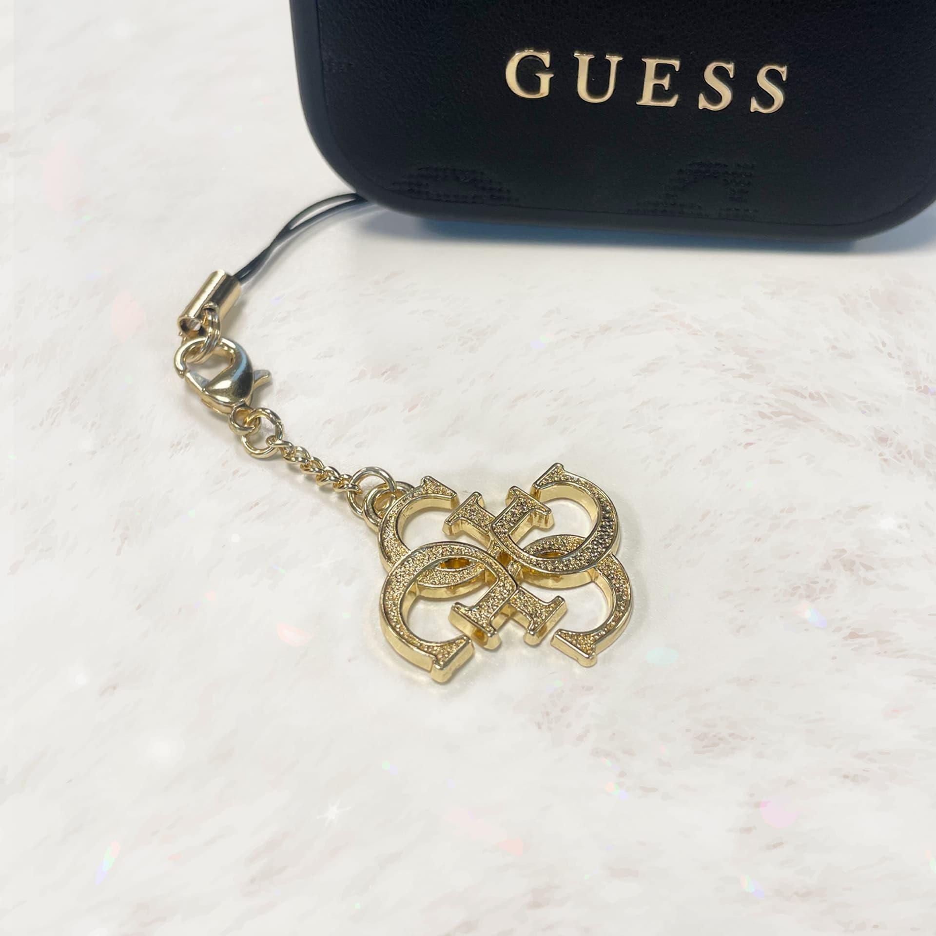Guess Zawieszka Gucpm4Gid Phone Strap 4G Glitter Charm - Zawieszki ...