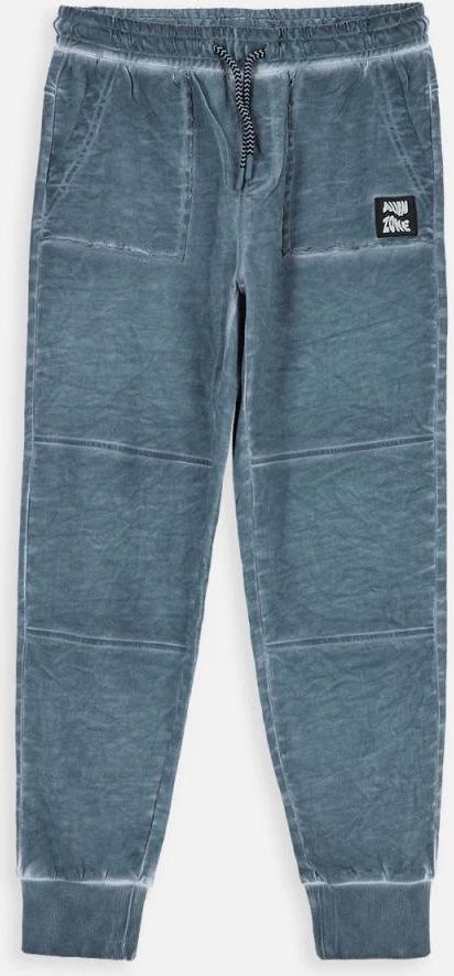 Spodnie dresowe szare z kieszeniami i przeszyciami na nogawkach o ...