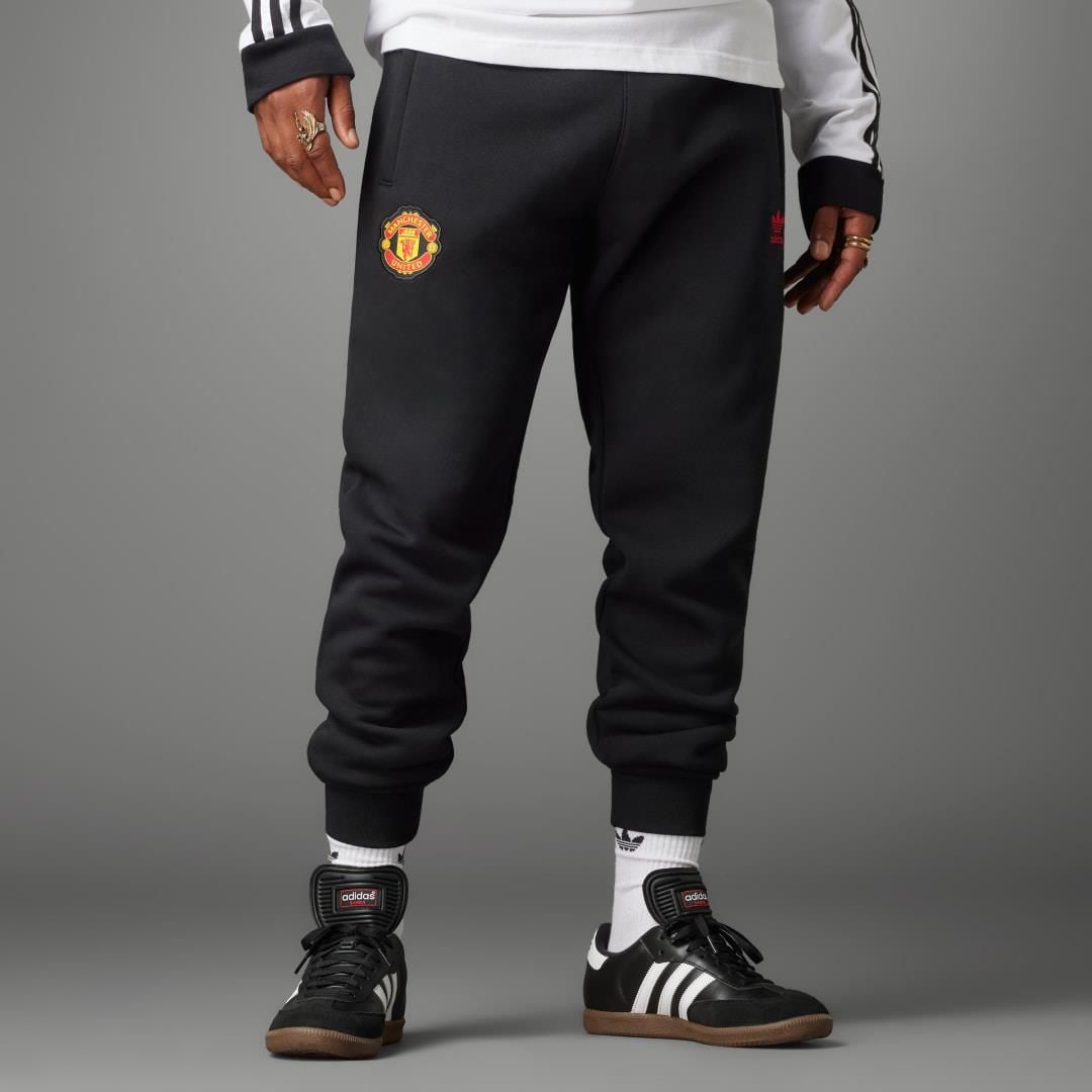 Adidas Spodnie Manchester United Essentials Trefoil IK8709 - Ceny i ...