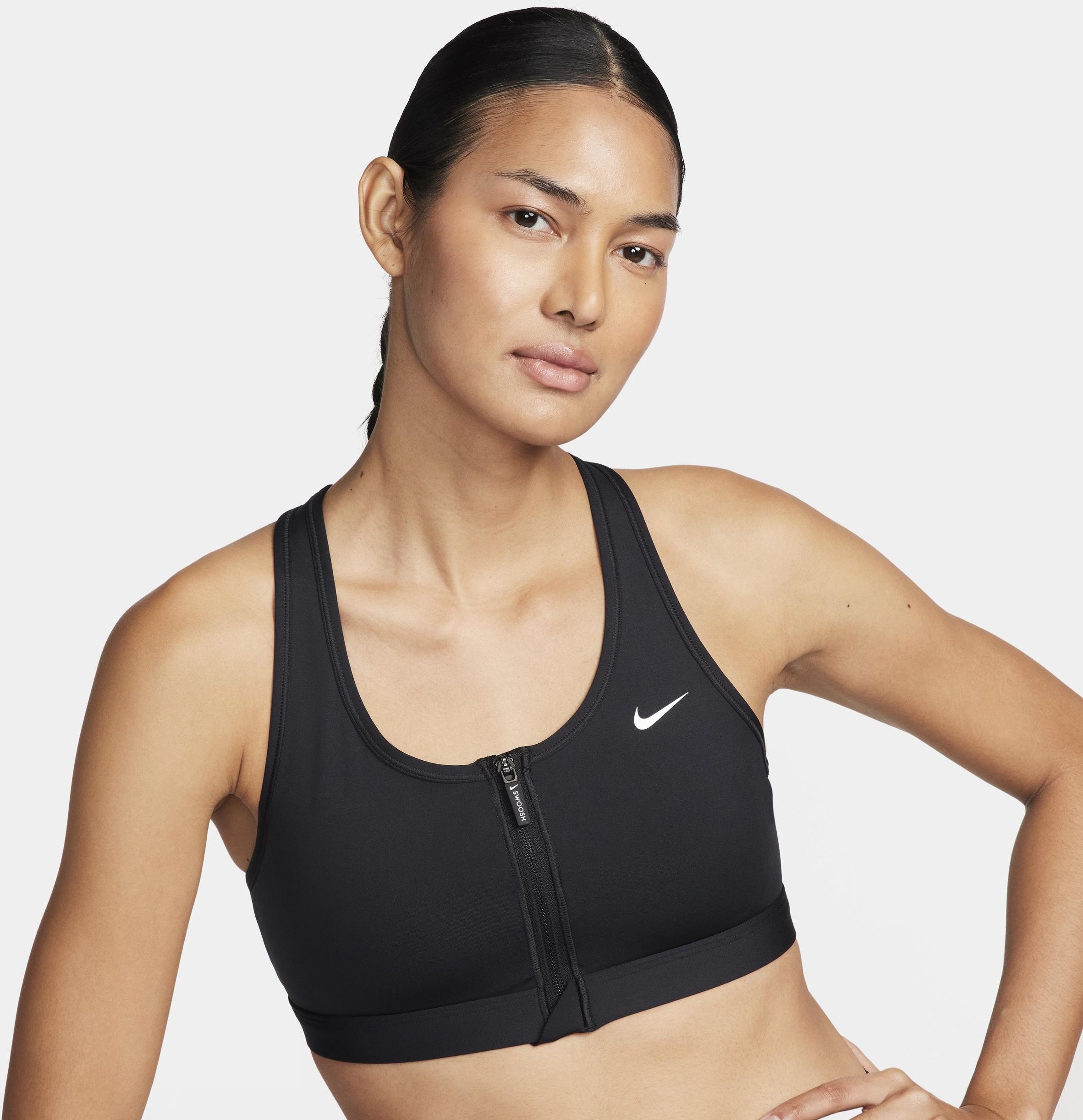 Damski stanik sportowy z wkładkami i średnim wsparciem Nike Swoosh ...