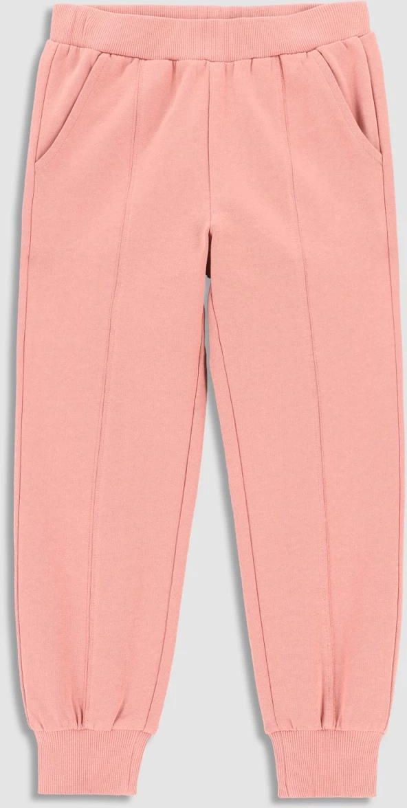 Spodnie dresowe pudrowy róż z przeszyciami i kieszeniami - Ceny i ...