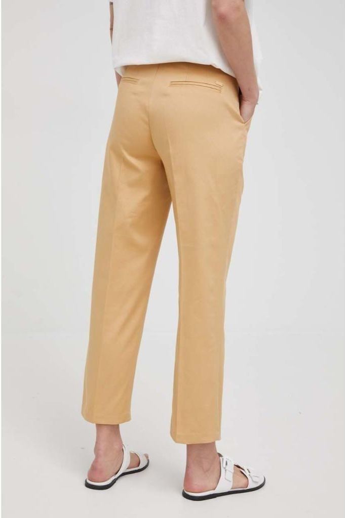Spodnie marki Scotch & Soda model 166136 kolor Brązowy. Odzież damska ...
