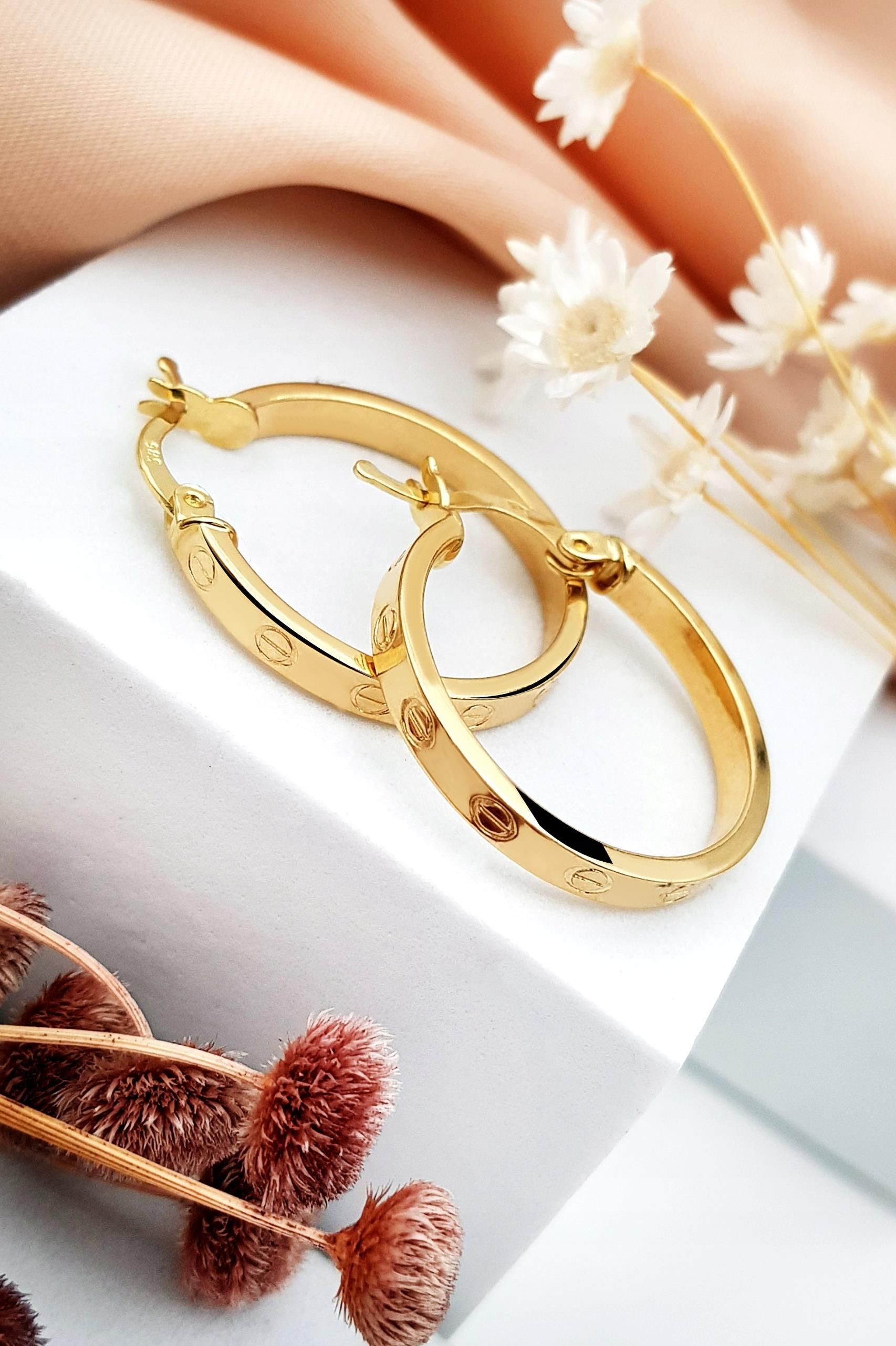 Złote kolczyki koła 2,2 cm z regularnym wzorem pr. 585 - Ceny i opinie ...