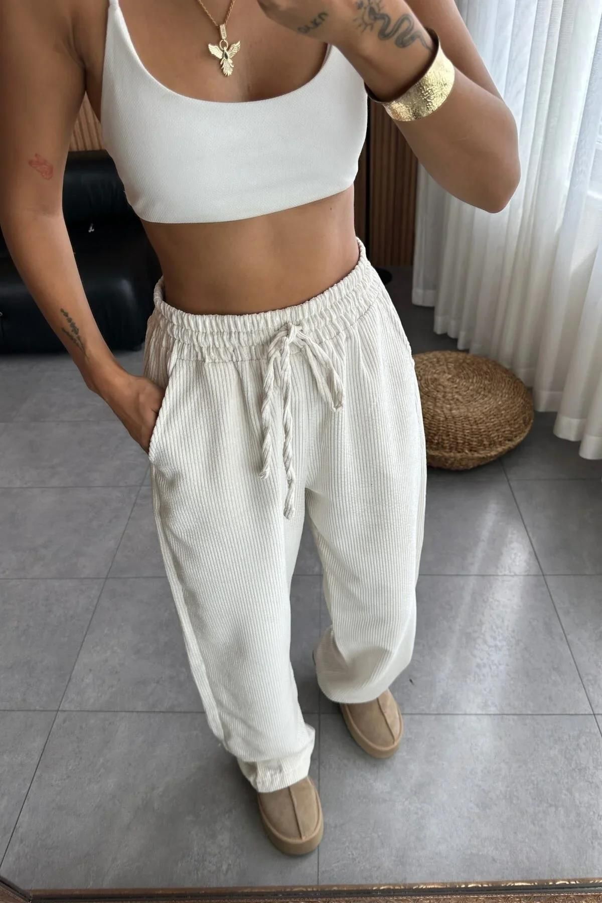 Prążkowane spodnie dresowe damskie - Kremowy - Ceny i opinie - Ceneo.pl