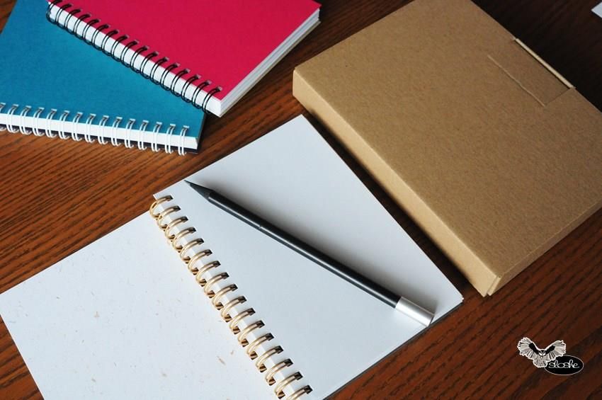 Notatnik A6 z ekologicznego papieru z grafiką białych kwiatów - Ceneo.pl