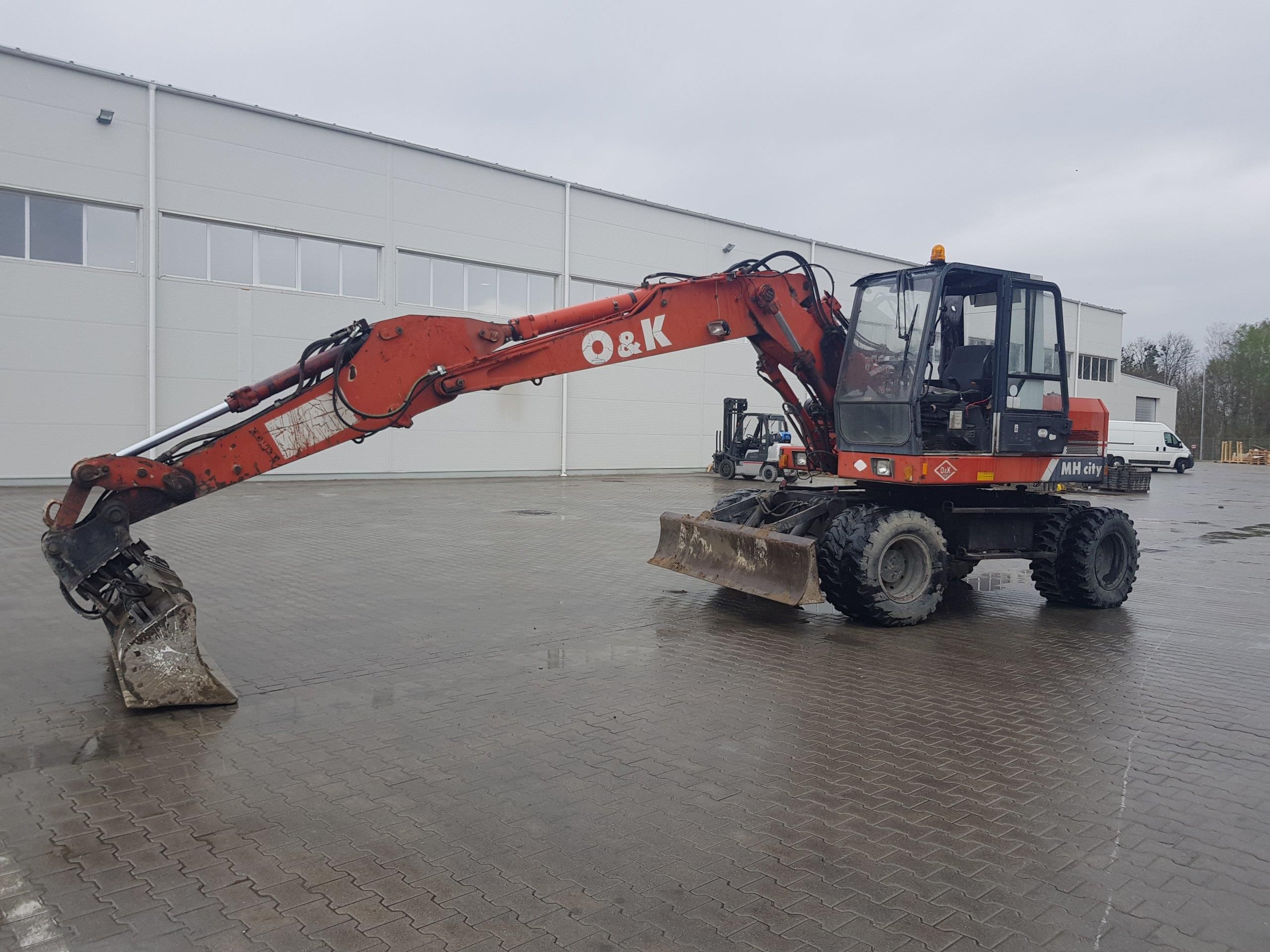 Koparka kołowa O&K MH CITY - Opinie i ceny na Ceneo.pl