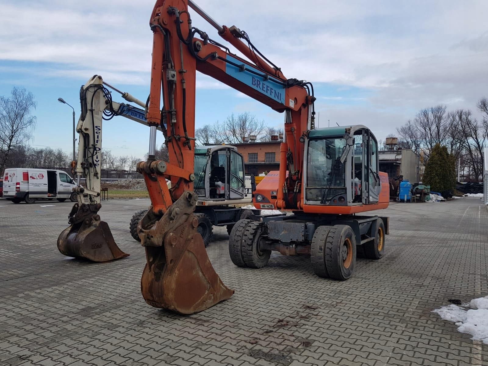 Koparka kołowa Atlas 1805M 18T jak CAT CASE - Opinie i ceny na Ceneo.pl