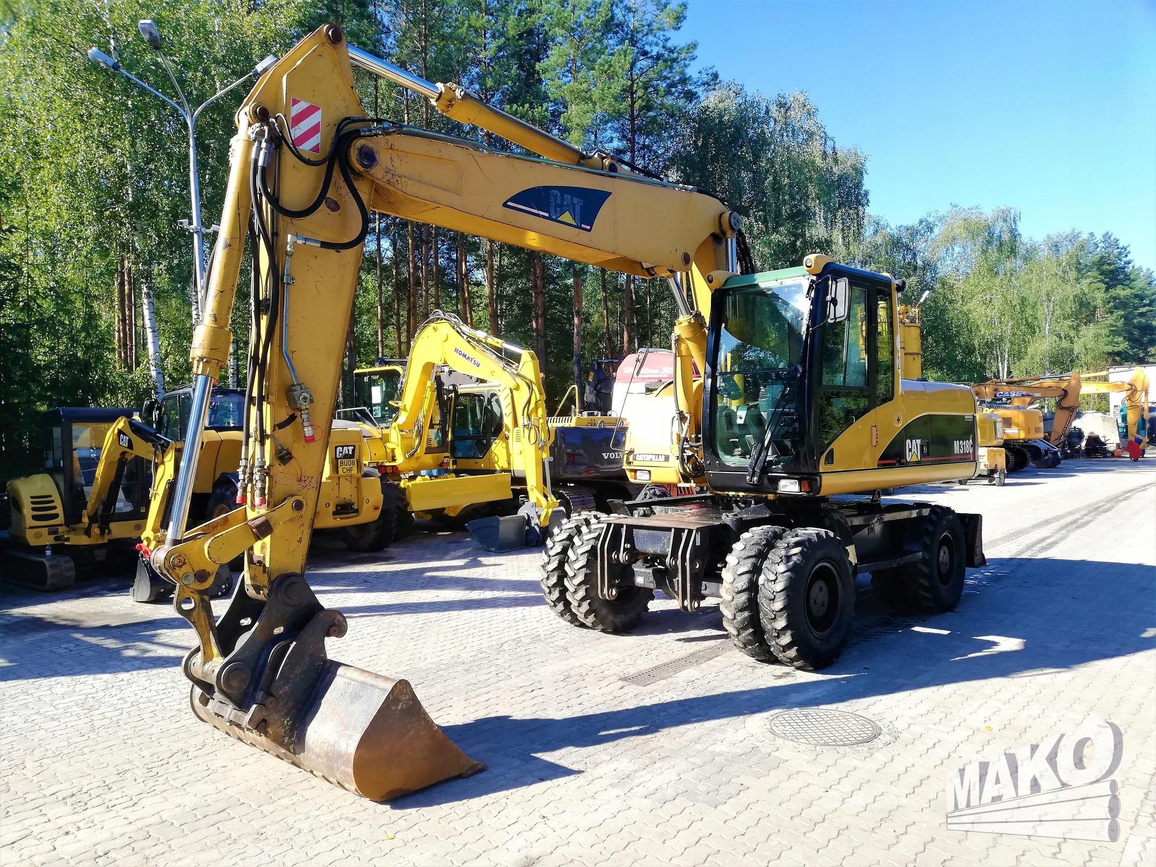 Caterpillar Koparka kołowa CAT M318C 2006r 18t - Opinie i ceny na Ceneo.pl