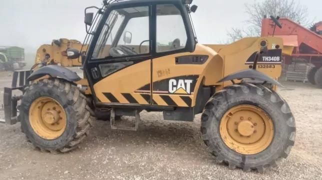 Caterpillar CAT TH 340B Ładowarka teleskopowa - Opinie i ceny na Ceneo.pl