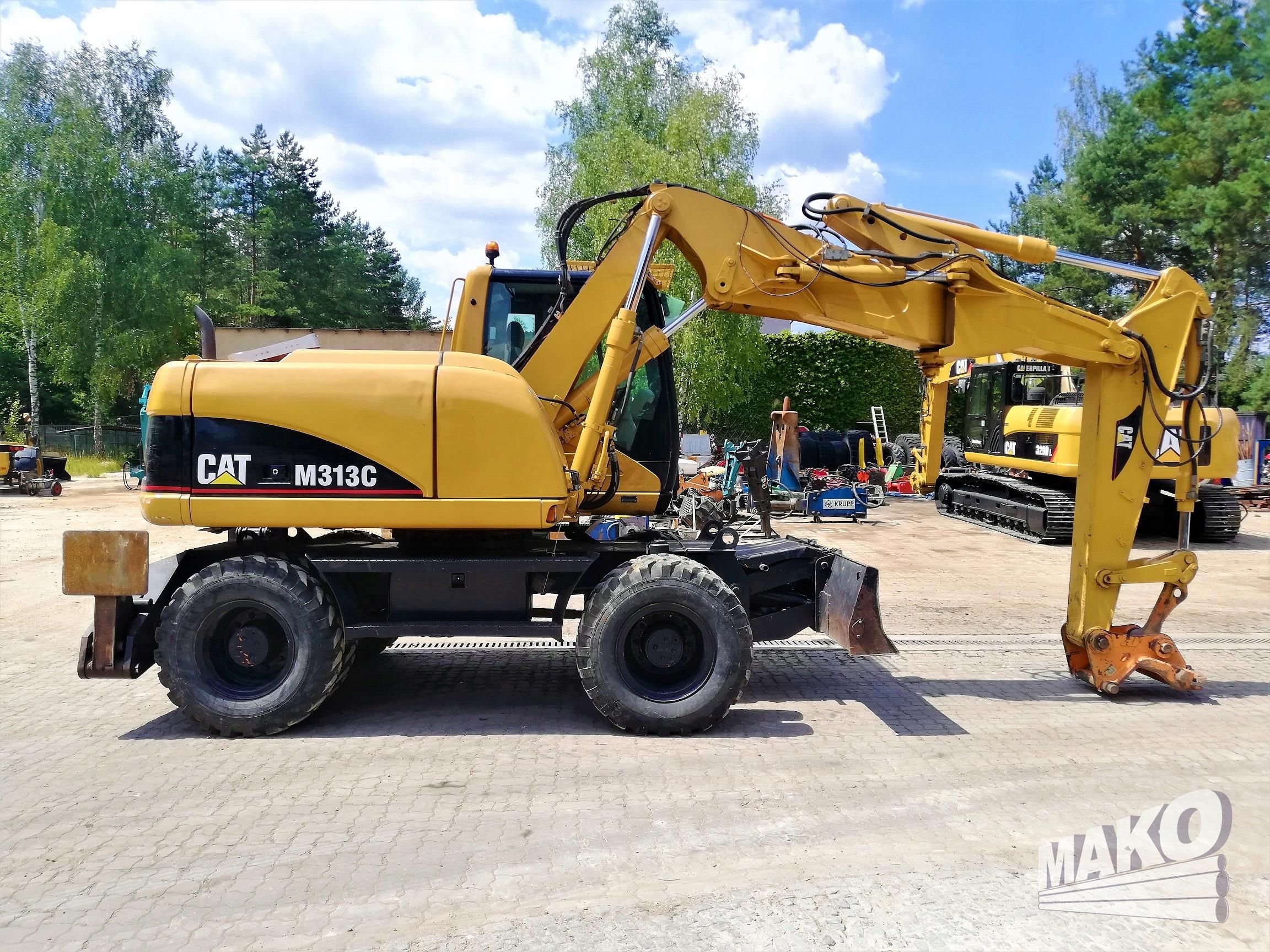 Caterpillar Koparka kołowa CAT M313C 2003r 13t - Opinie i ceny na Ceneo.pl