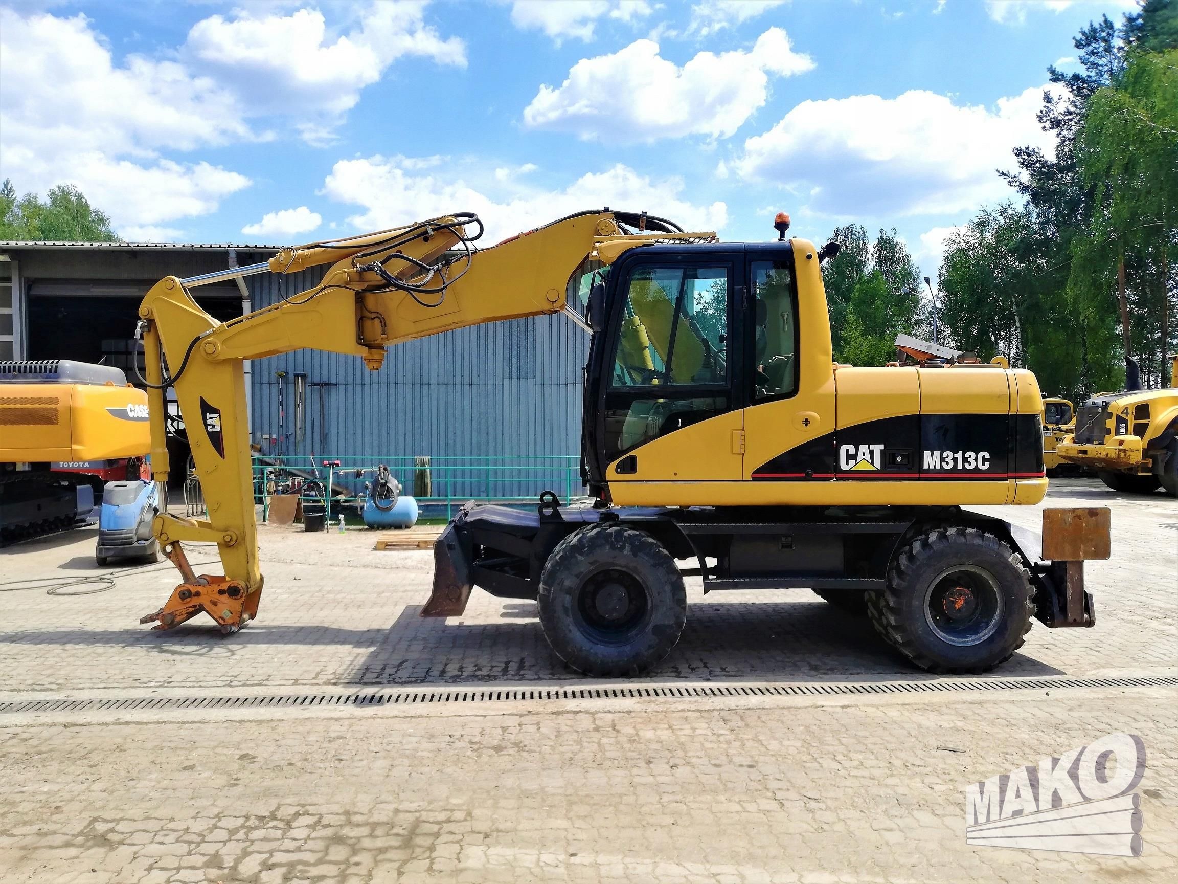Caterpillar Koparka kołowa CAT M313C 2003r 13t - Opinie i ceny na Ceneo.pl