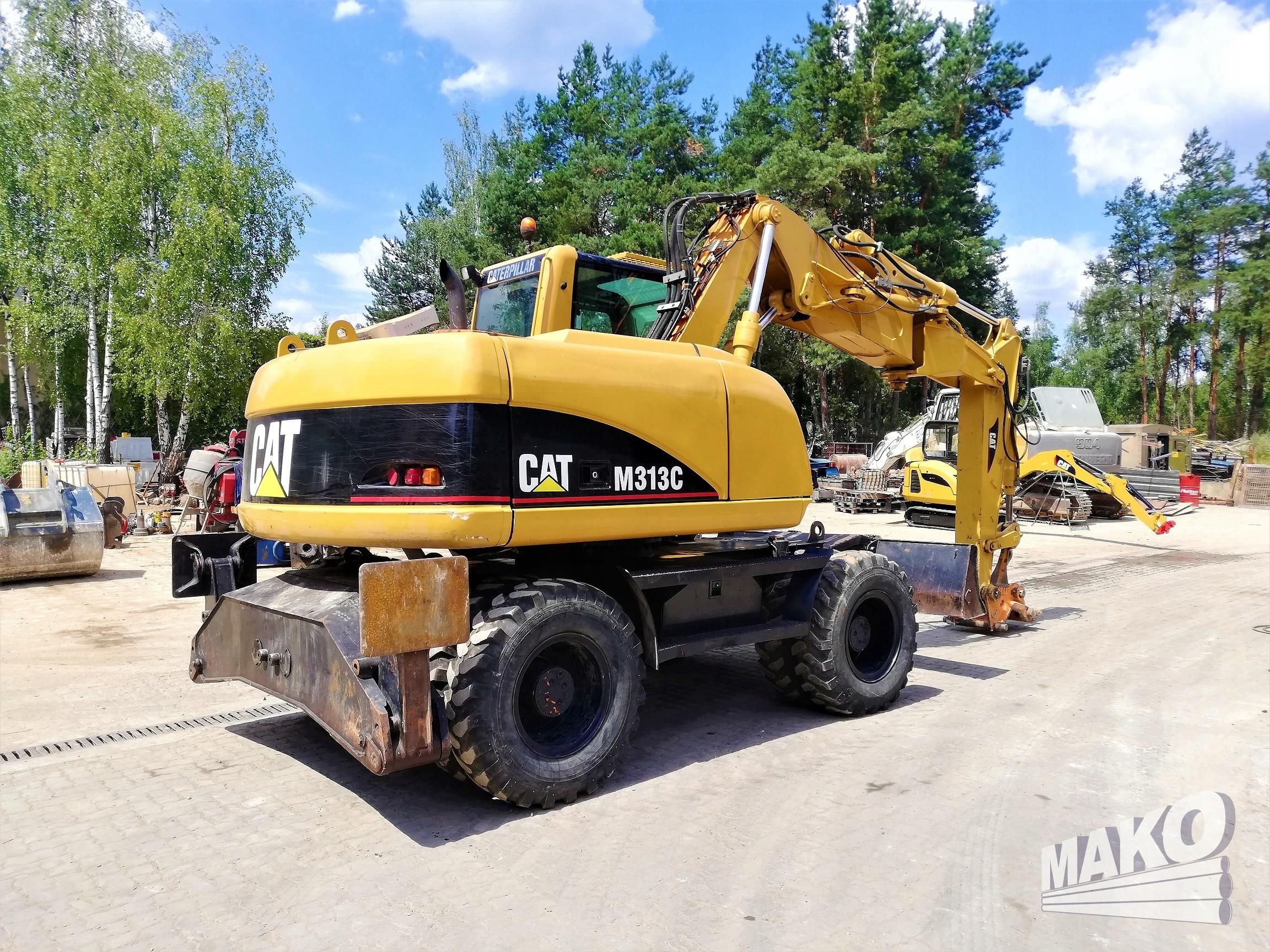 Caterpillar Koparka kołowa CAT M313C 2003r 13t - Opinie i ceny na Ceneo.pl