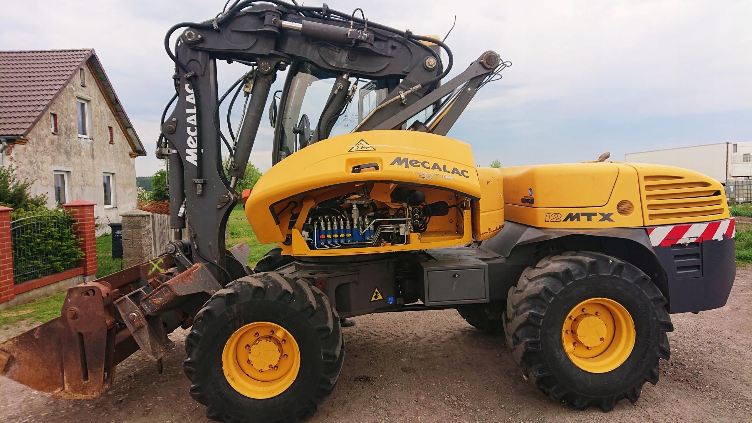 Mecalac 12MXT MTX MSX koparka kołowa sprowadzona - Opinie i ceny na Ceneo.pl