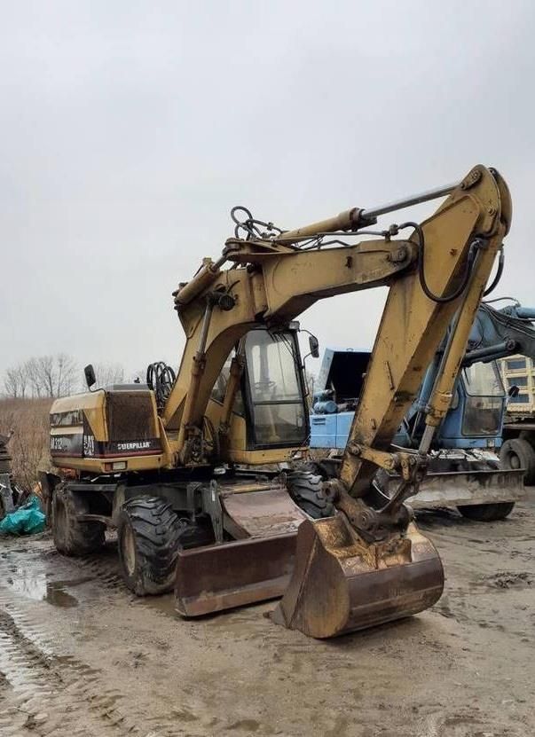 Caterpillar CAT M312 Koparka kołowa - Opinie i ceny na Ceneo.pl