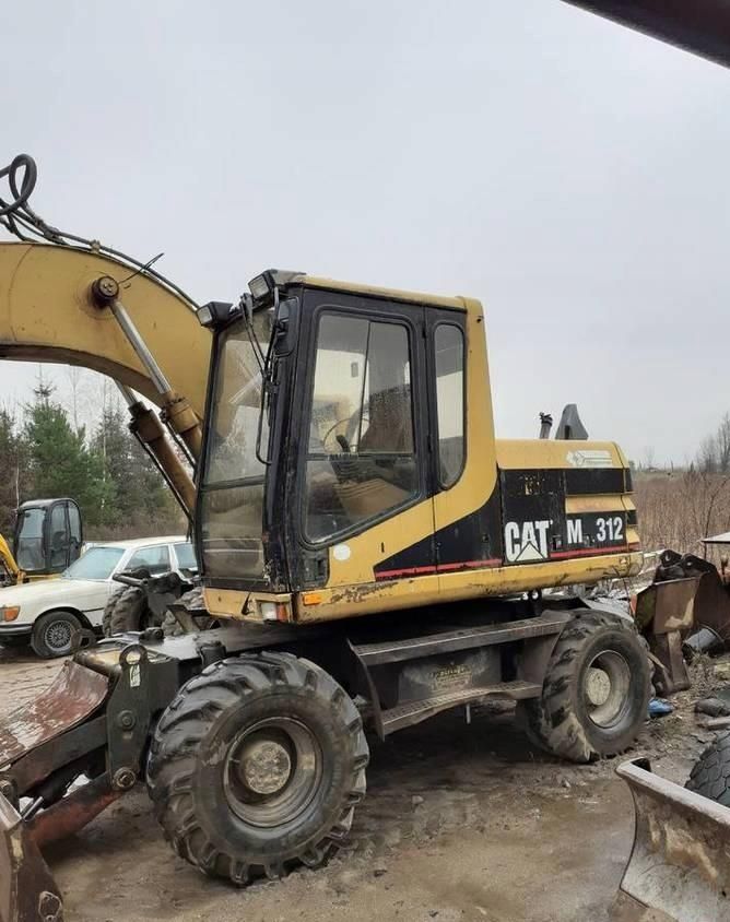 Caterpillar CAT M312 Koparka kołowa - Opinie i ceny na Ceneo.pl