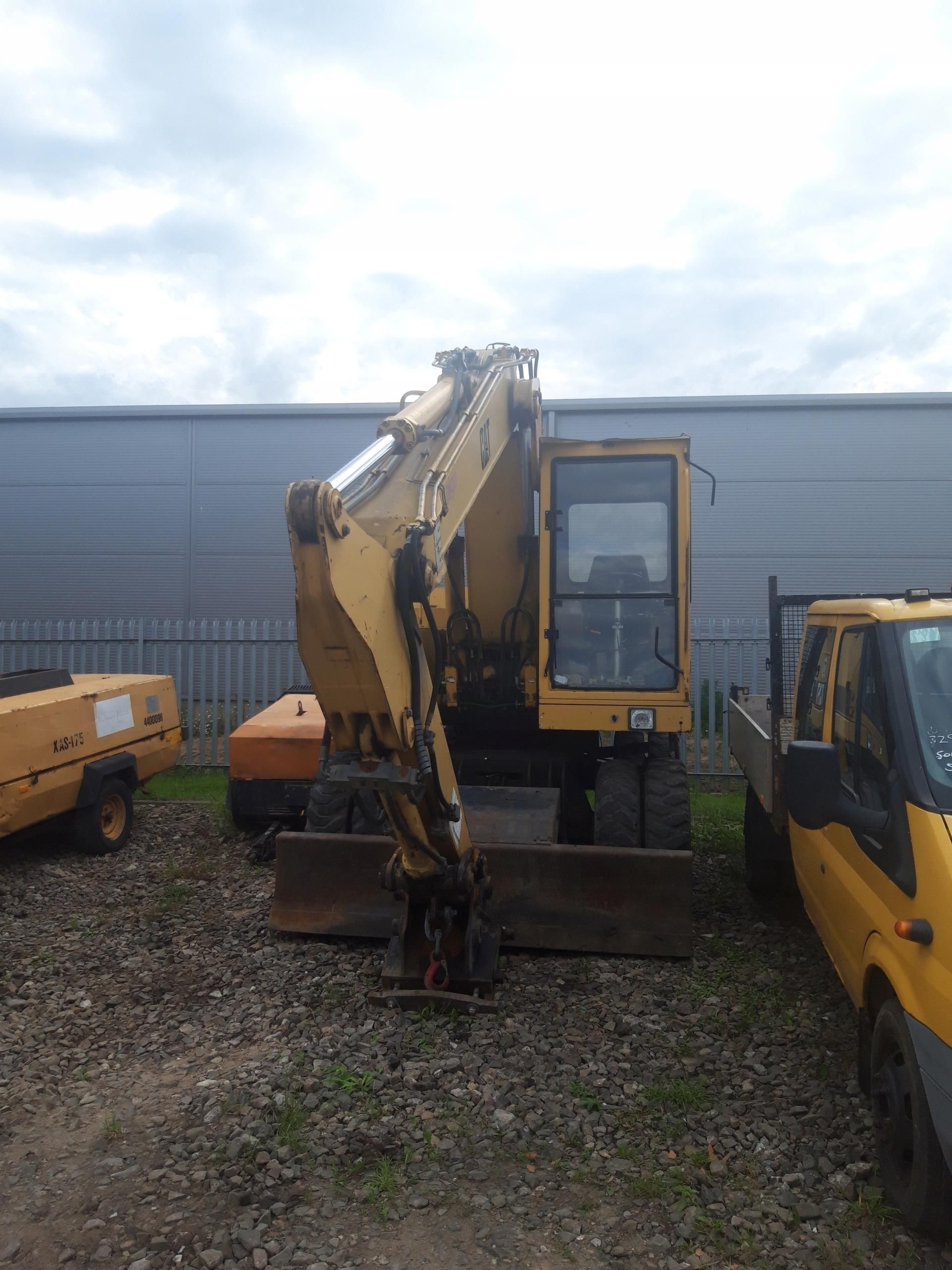 Koparka kołowa CAT CATERPILLAR 212 BFT 15 T oryg! - Opinie i ceny na ...