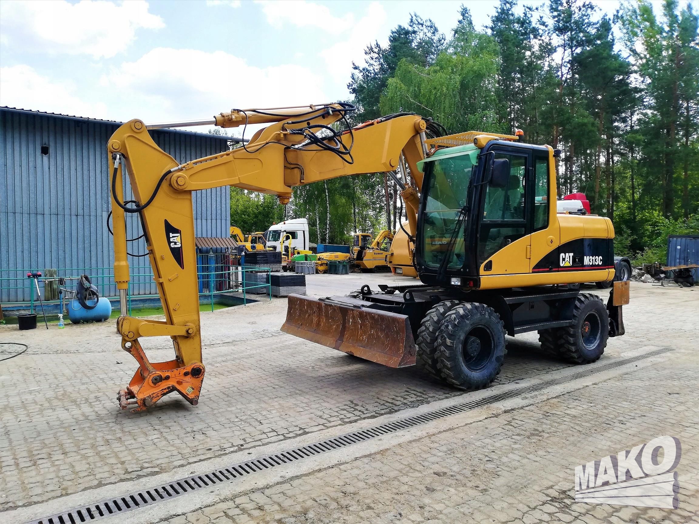 Caterpillar Koparka kołowa CAT M313C 2003r 13t - Opinie i ceny na Ceneo.pl