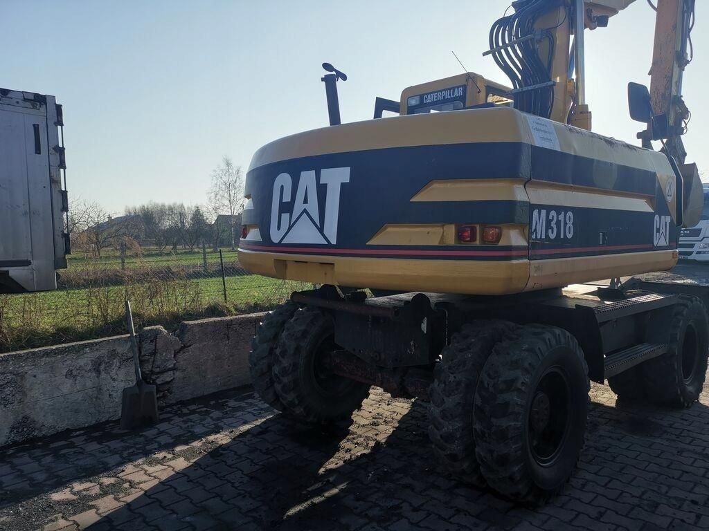Caterpillar CAT M318 koparka kołowa - Opinie i ceny na Ceneo.pl