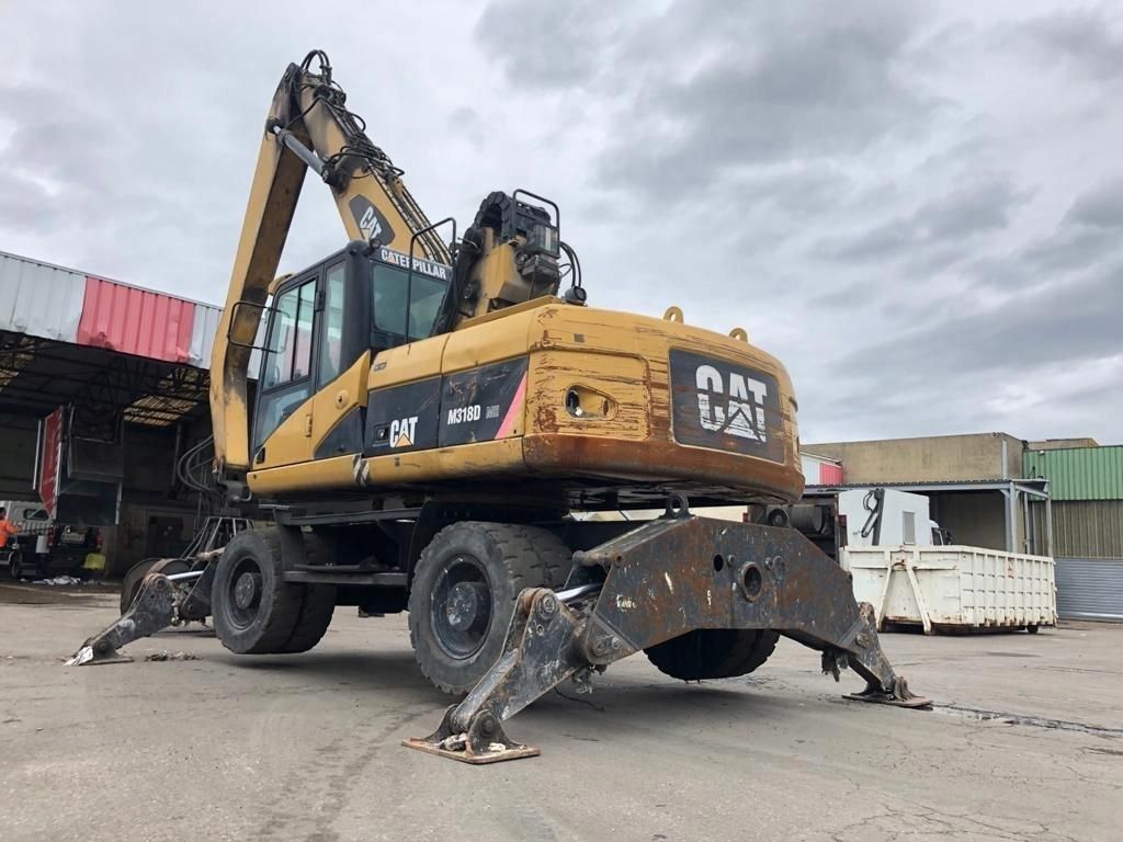 Caterpillar CAT M318D koparka kołowa - Opinie i ceny na Ceneo.pl