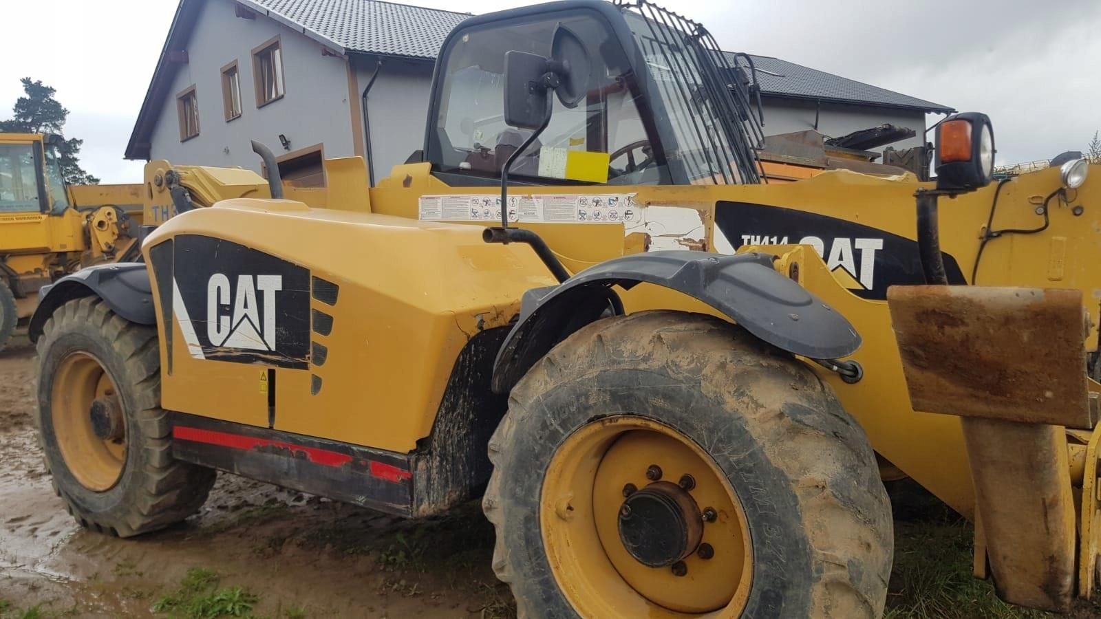Caterpillar CAT TH414 ładowarka teleskopowa - Opinie i ceny na Ceneo.pl
